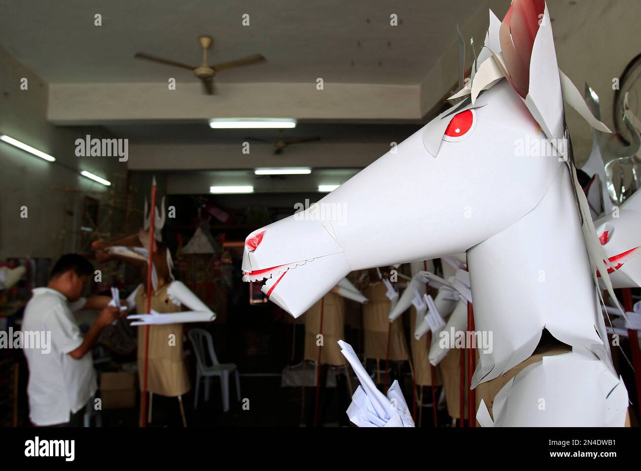A paper statue of Horse-Face, a guardian of hell in Chinese mythology ...
