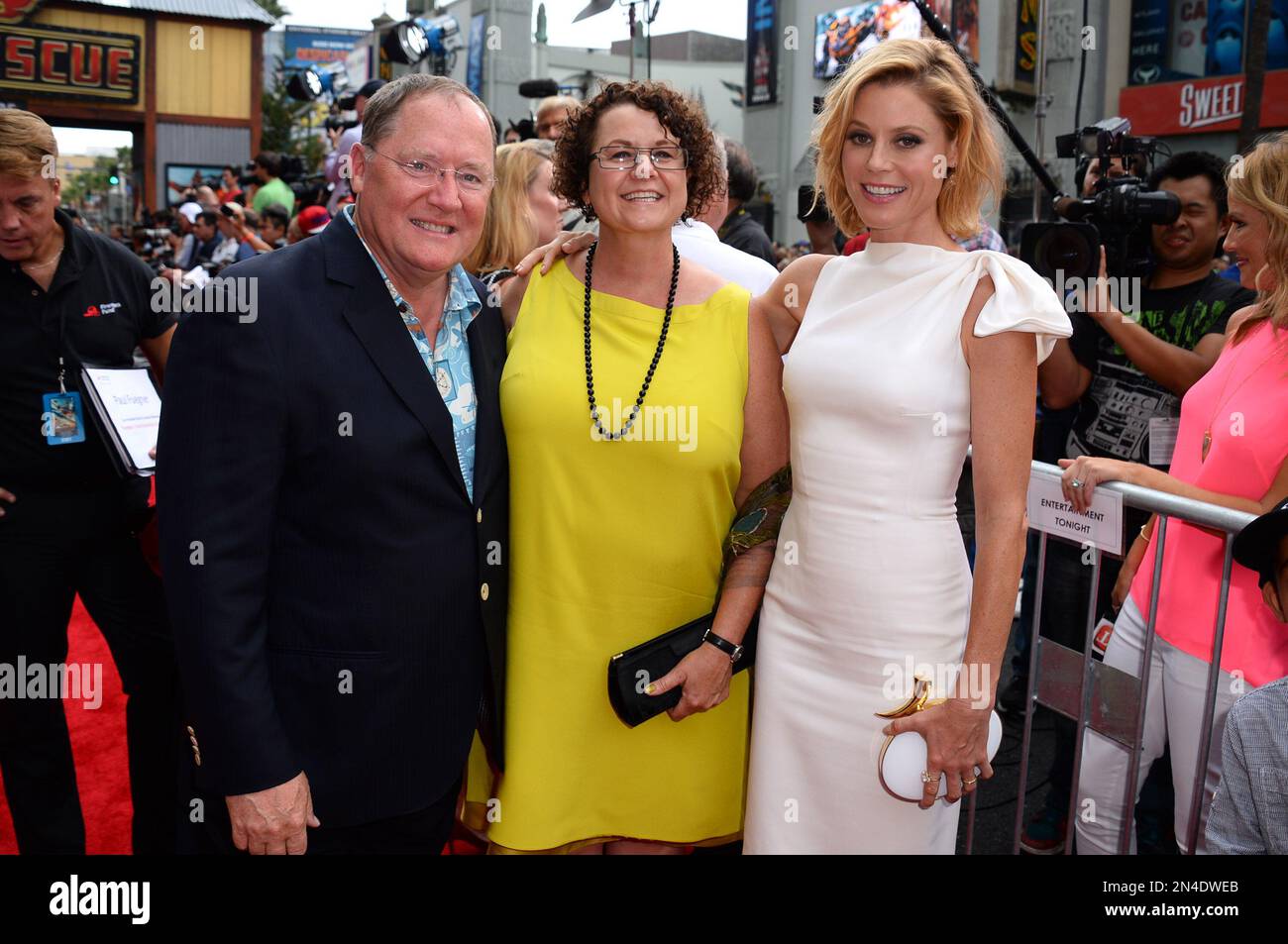 John Lasseter and Julie Bowen attend the world premiere of "Planes ...