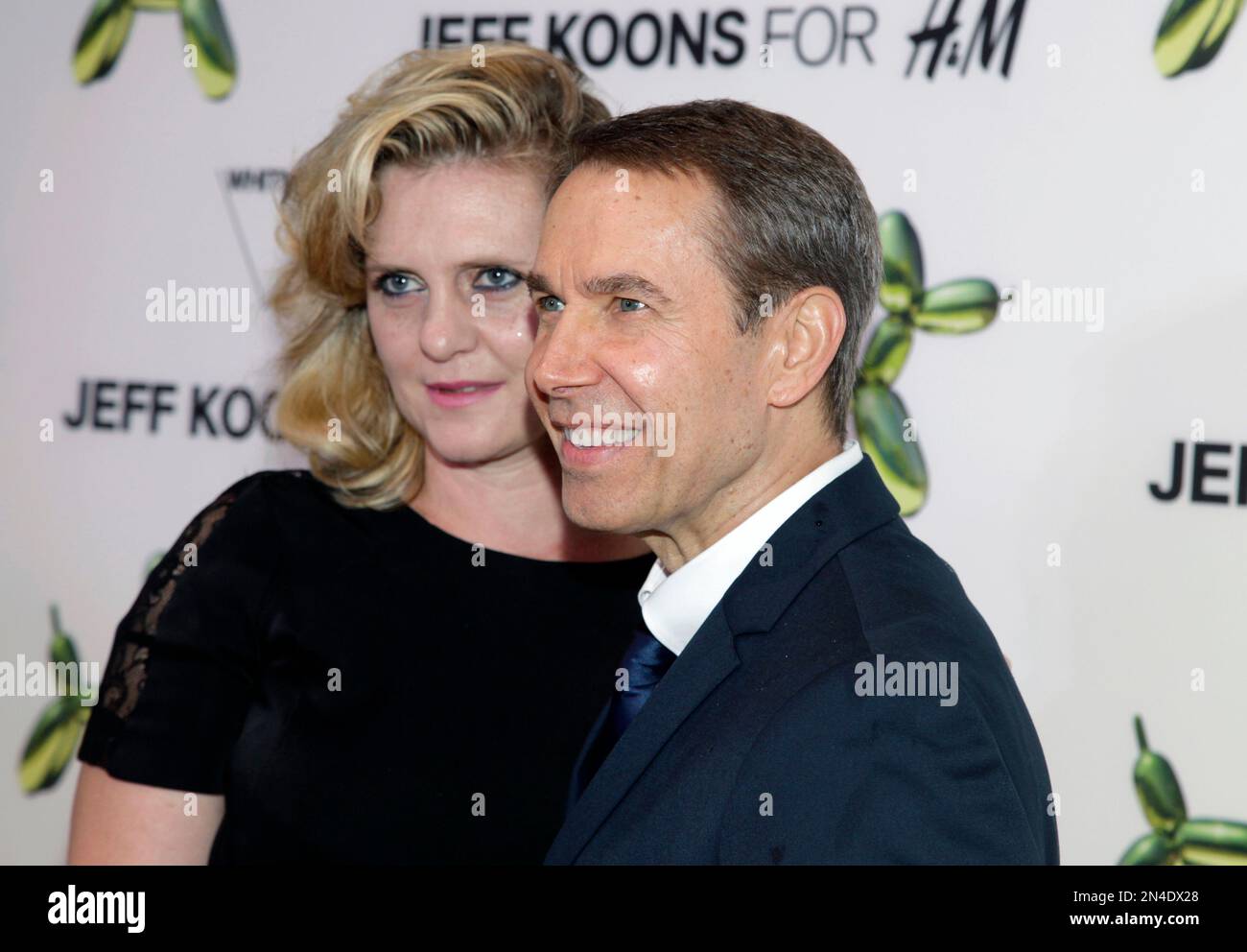 Artist Jeff Koons, right, with his wife Justine Wheeler Koons, left ...