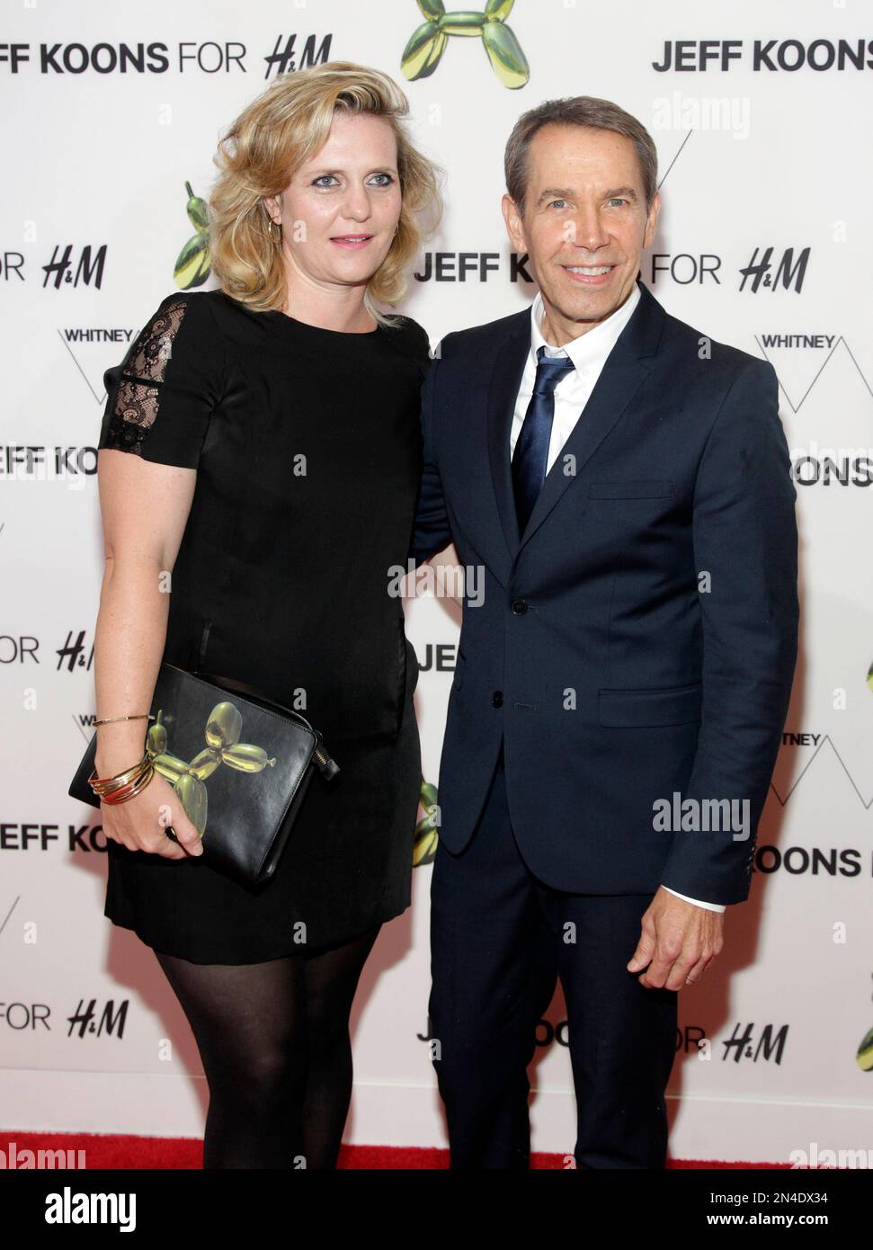 Artist Jeff Koons, right, with his wife Justine Wheeler Koons, left ...