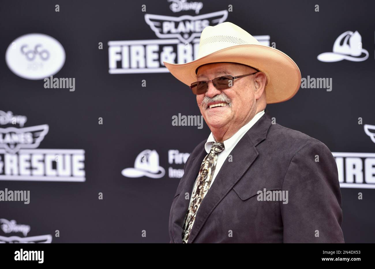 Barry Corbin arrives at the premiere of Disney’s Planes: Fire & Rescue ...