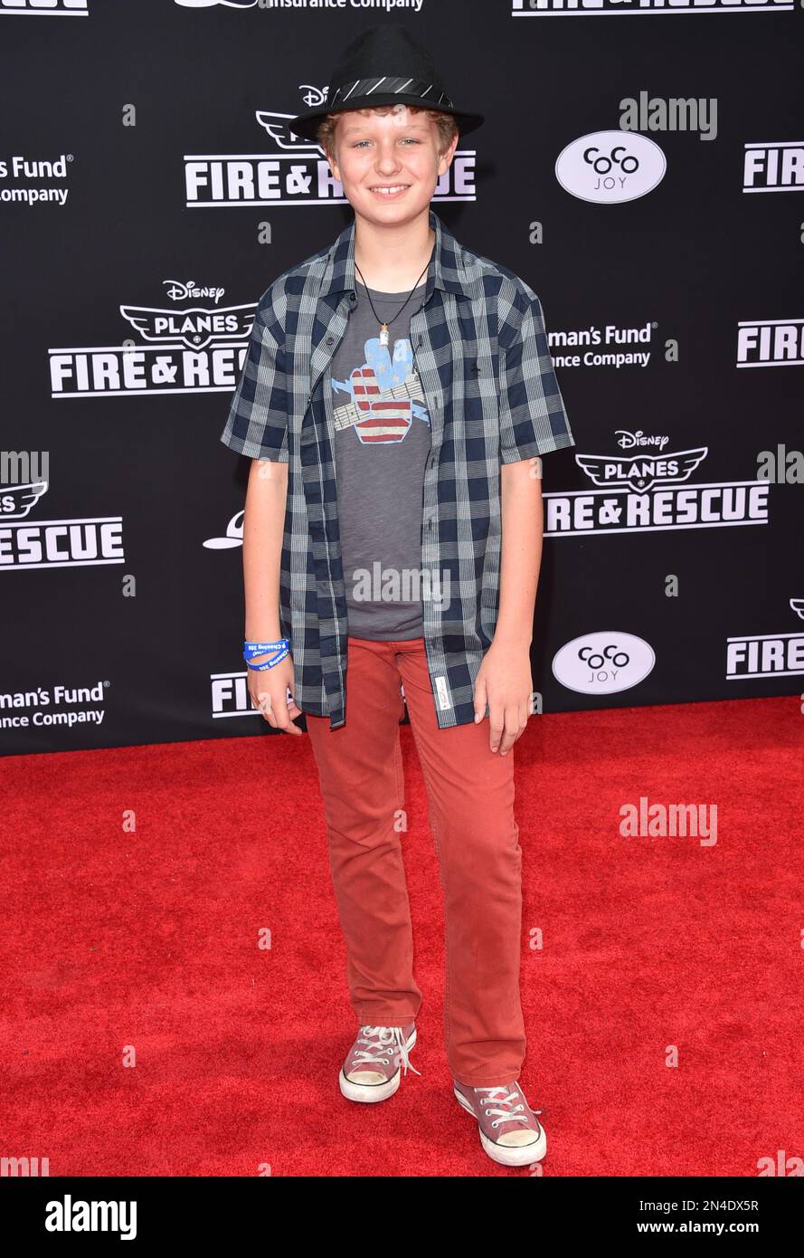Riley Thomas Stewart arrives at the premiere of Disney’s Planes: Fire ...
