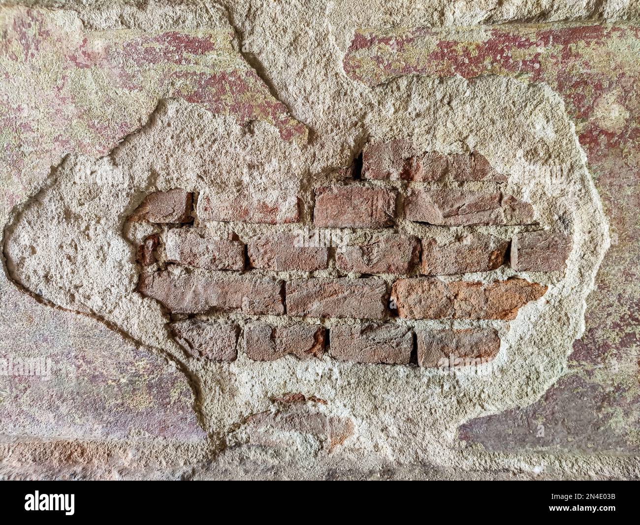 Texture of old brick wall with collapsed plaster. Background of shabby ...