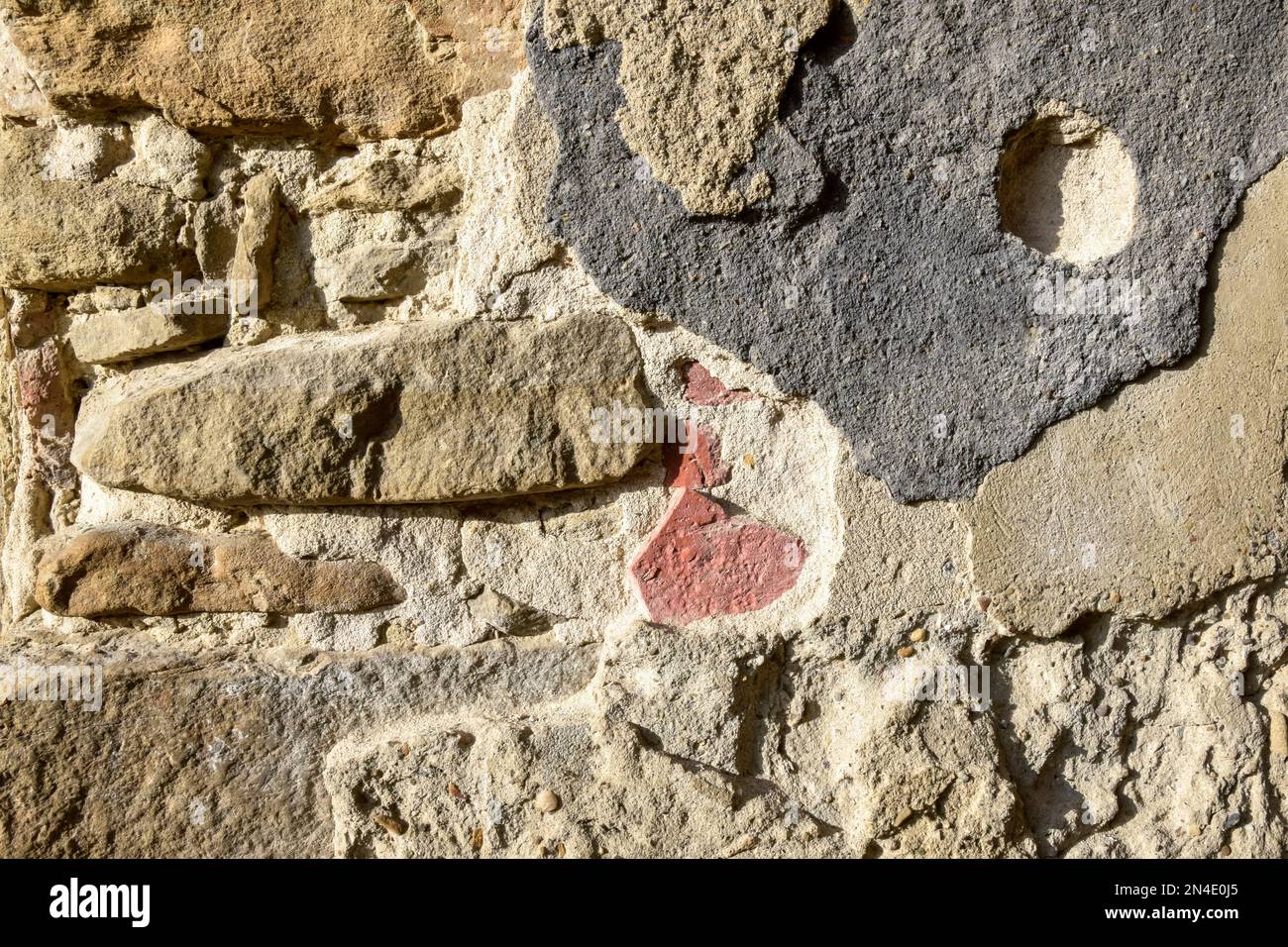 Texture of old stone wall with collapsed plaster. Background of shabby ...