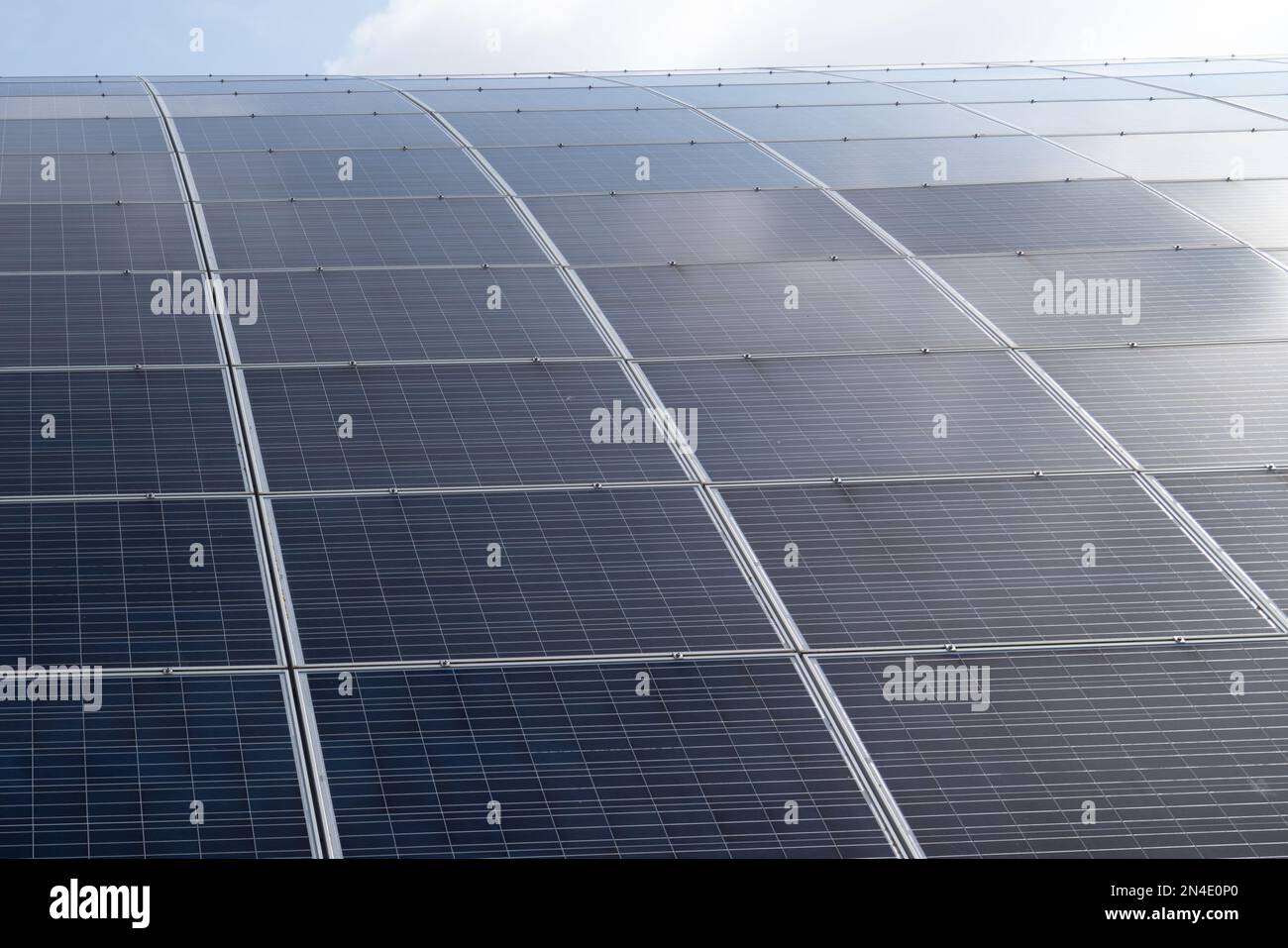round solar panels and sky background Stock Photo - Alamy