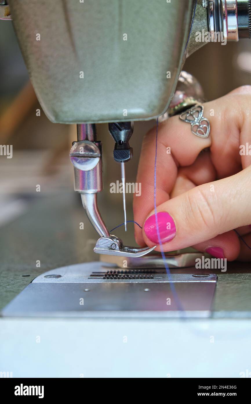 Threading a sewing machine hi-res stock photography and images - Alamy