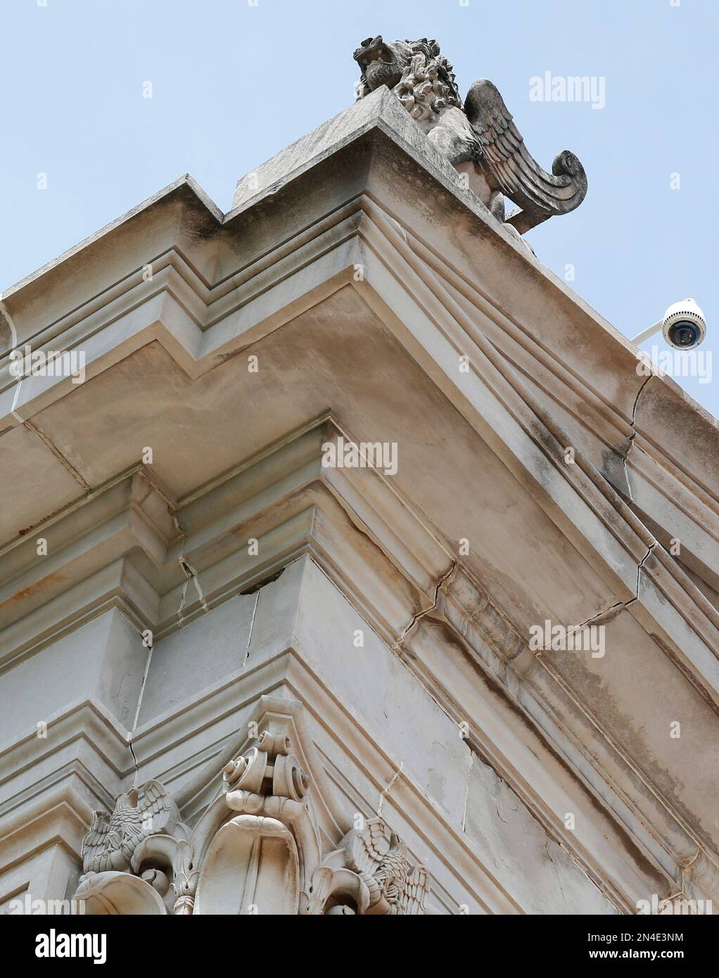 In this Thursday, June 26, 2014 photo, cracks where mortar has fallen ...