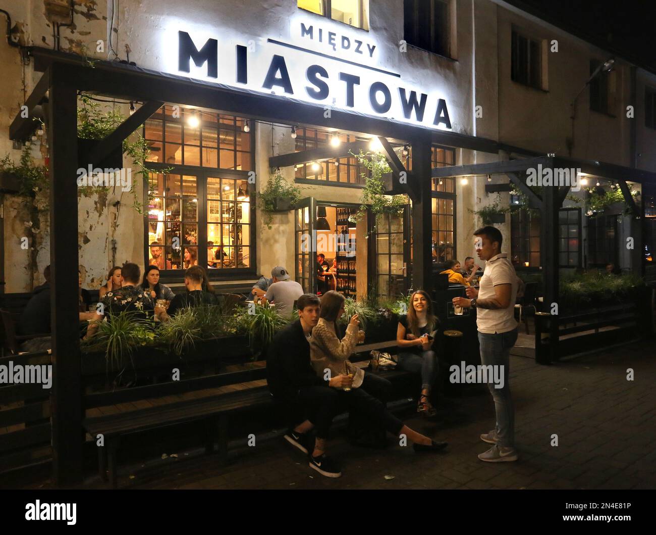 Cracow. Krakow.Poland. People having good time in open air restaurant ...