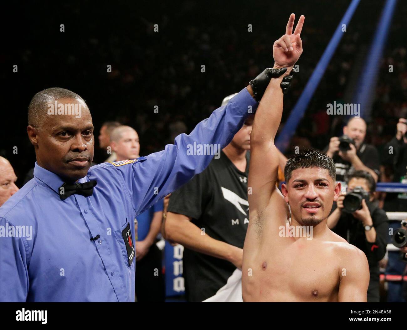 Abner Mares is declared the winner over Jonathan Oquendo after their ...