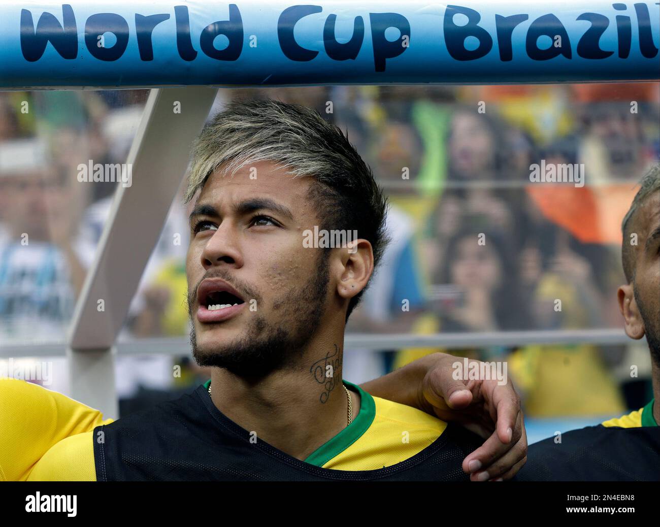 Brazil's Neymar sings his country's national anthem before the start of ...