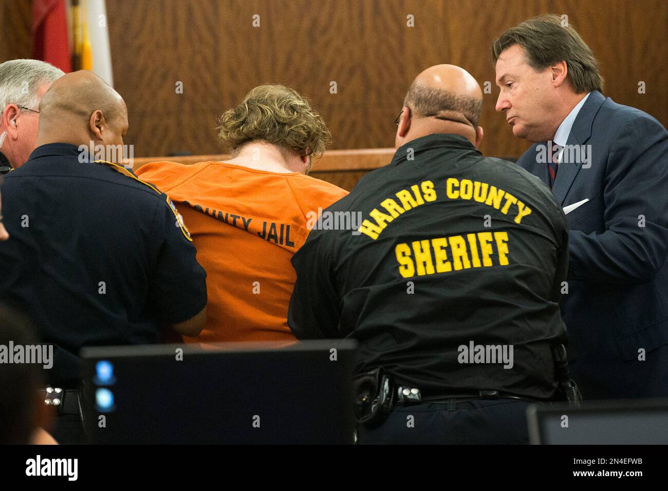 Ronald Lee Haskell is wheeled from the courtroom after collapsing ...