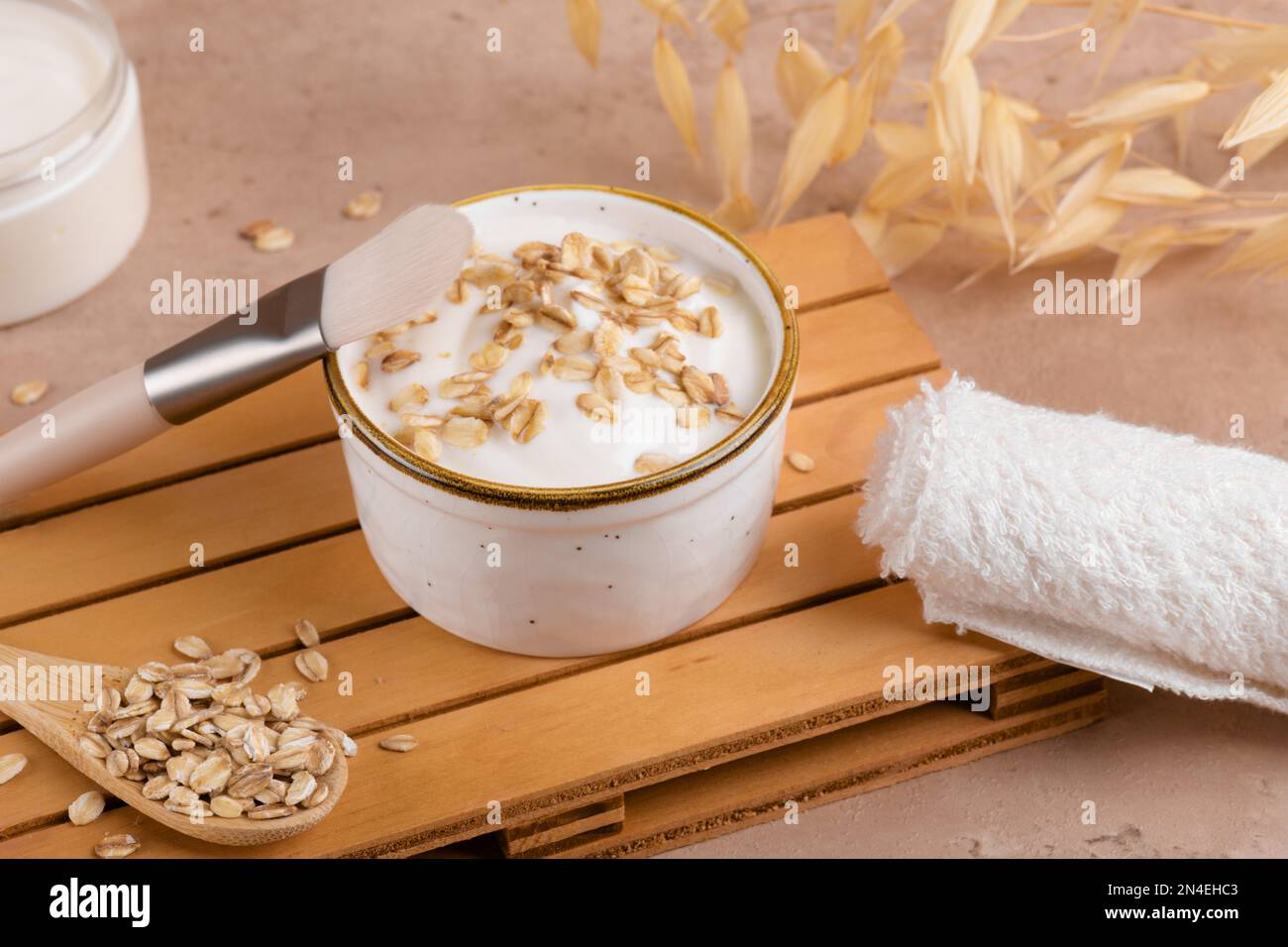 Homemade facial mask or creamy scrub with cereal, made of yogurt and ...