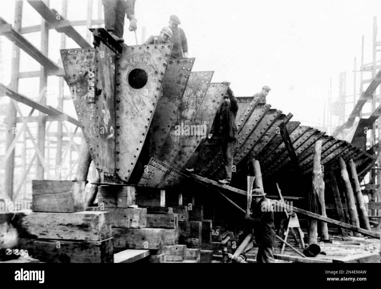 Shipbuilders work on a 4500 ton reinforced concrete ship at an American ...