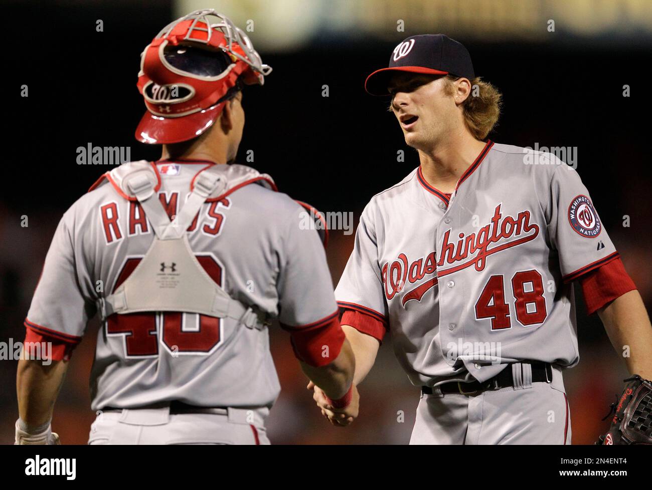 Washington Nationals relief pitcher Ross Detwiler, right, shakes hands ...