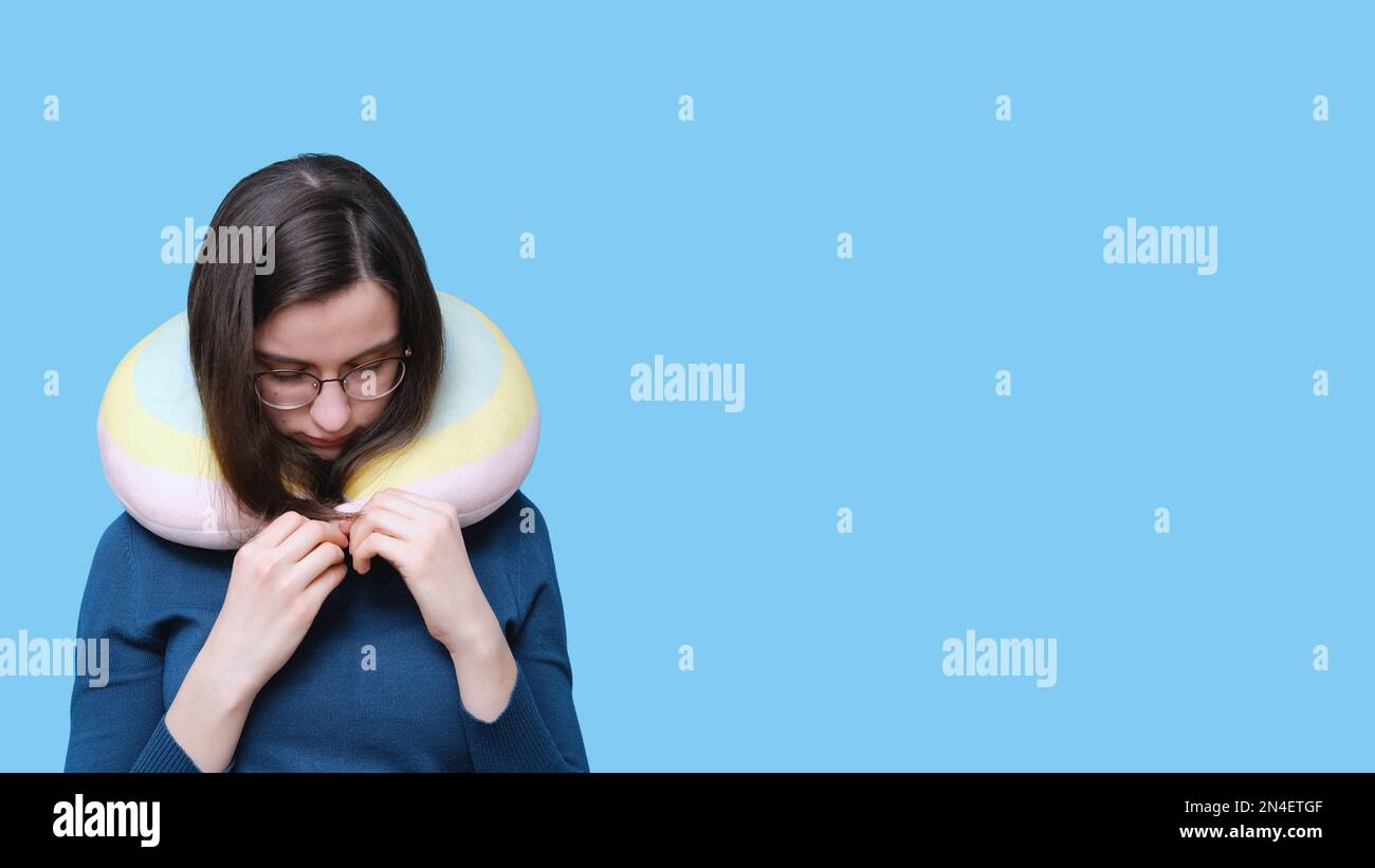 Portrait of a student girl in glasses and a sweater sleeping in a ...