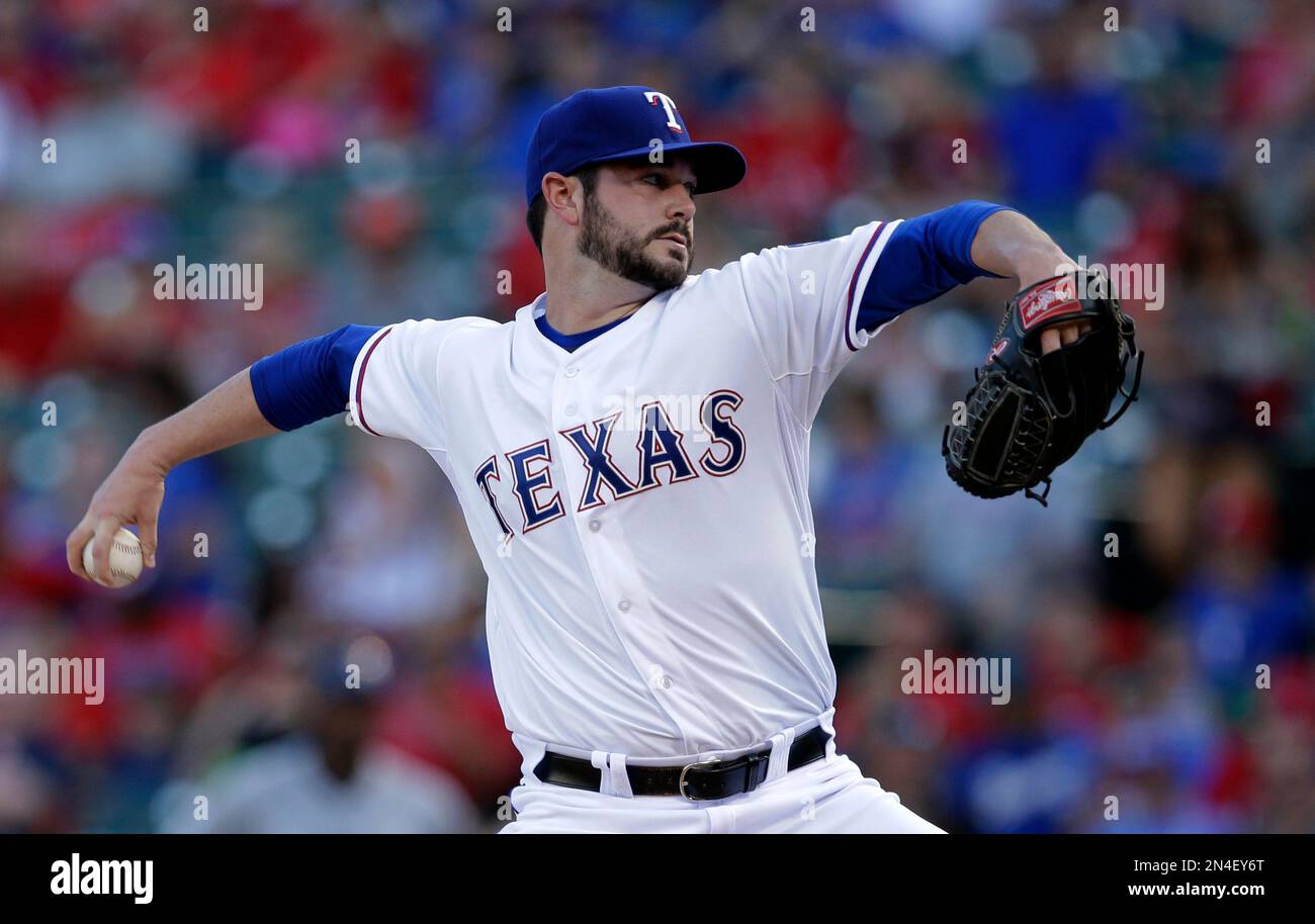 Texas Rangers starting pitcher Phil Irwin works against the Houston ...