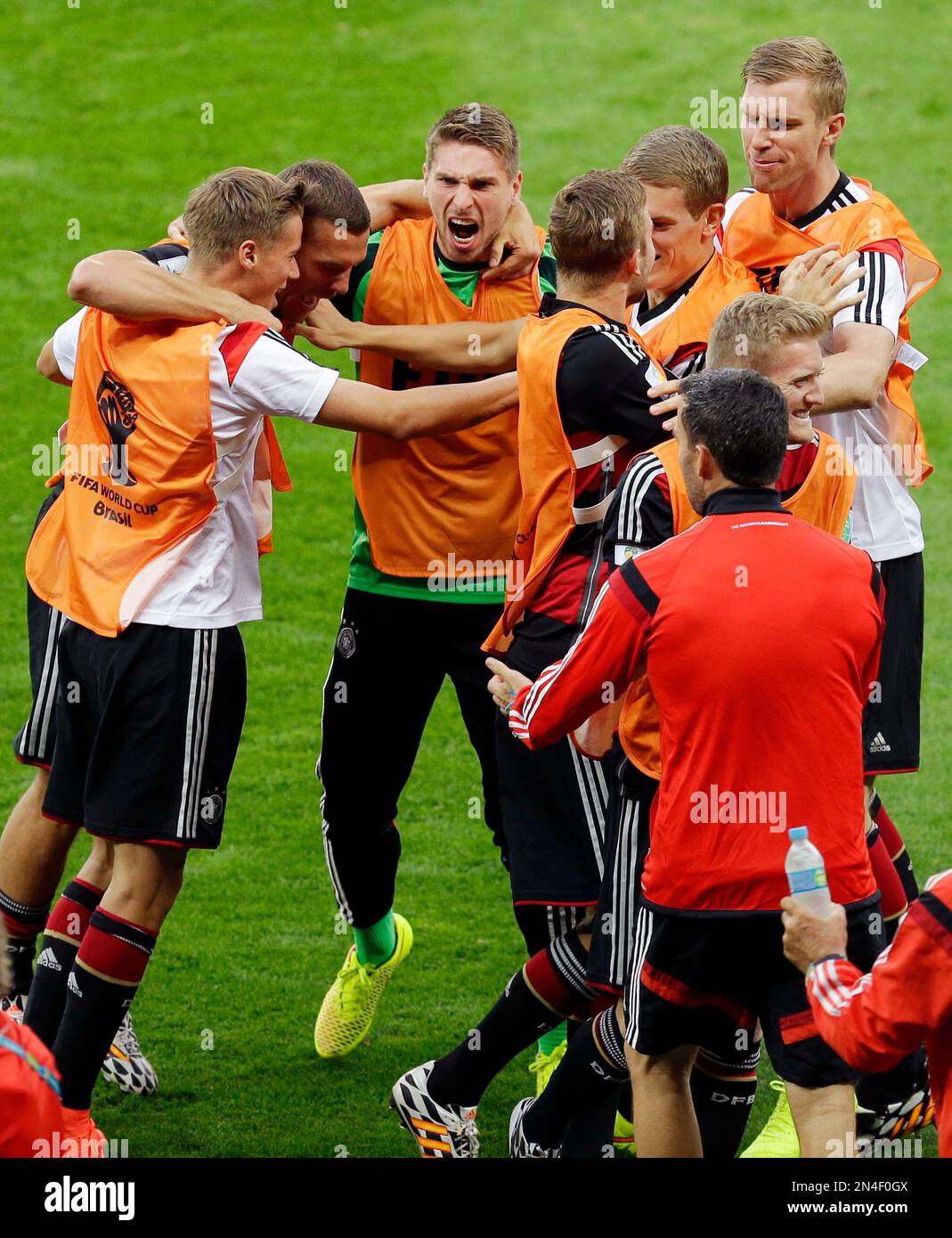 Germany's bench players celebrate after Thomas Mueller scored during ...