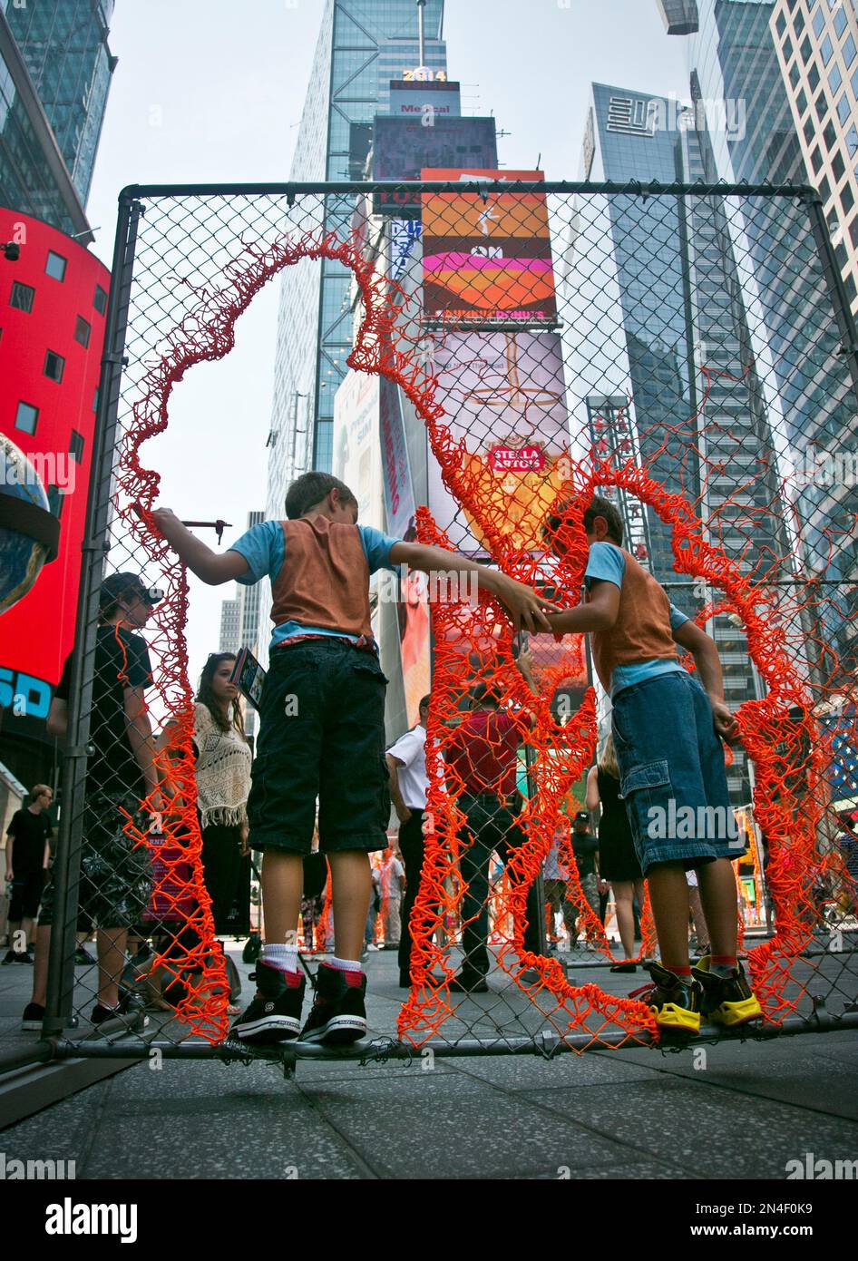 Children walk through sculptures titled "Nearness" by Cuban artist ...