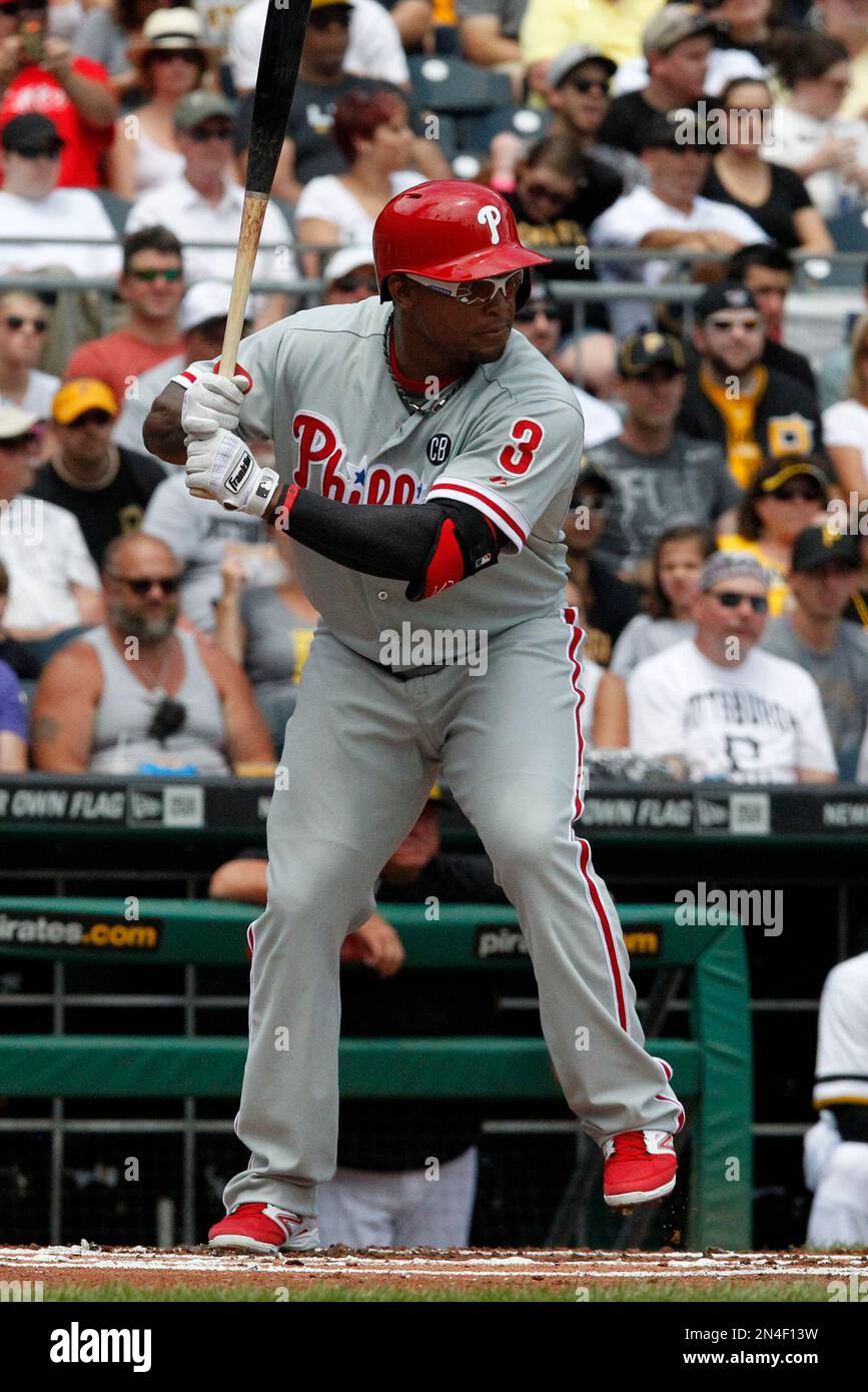 Philadelphia Phillies' Marlon Byrd singles home a run during the first ...