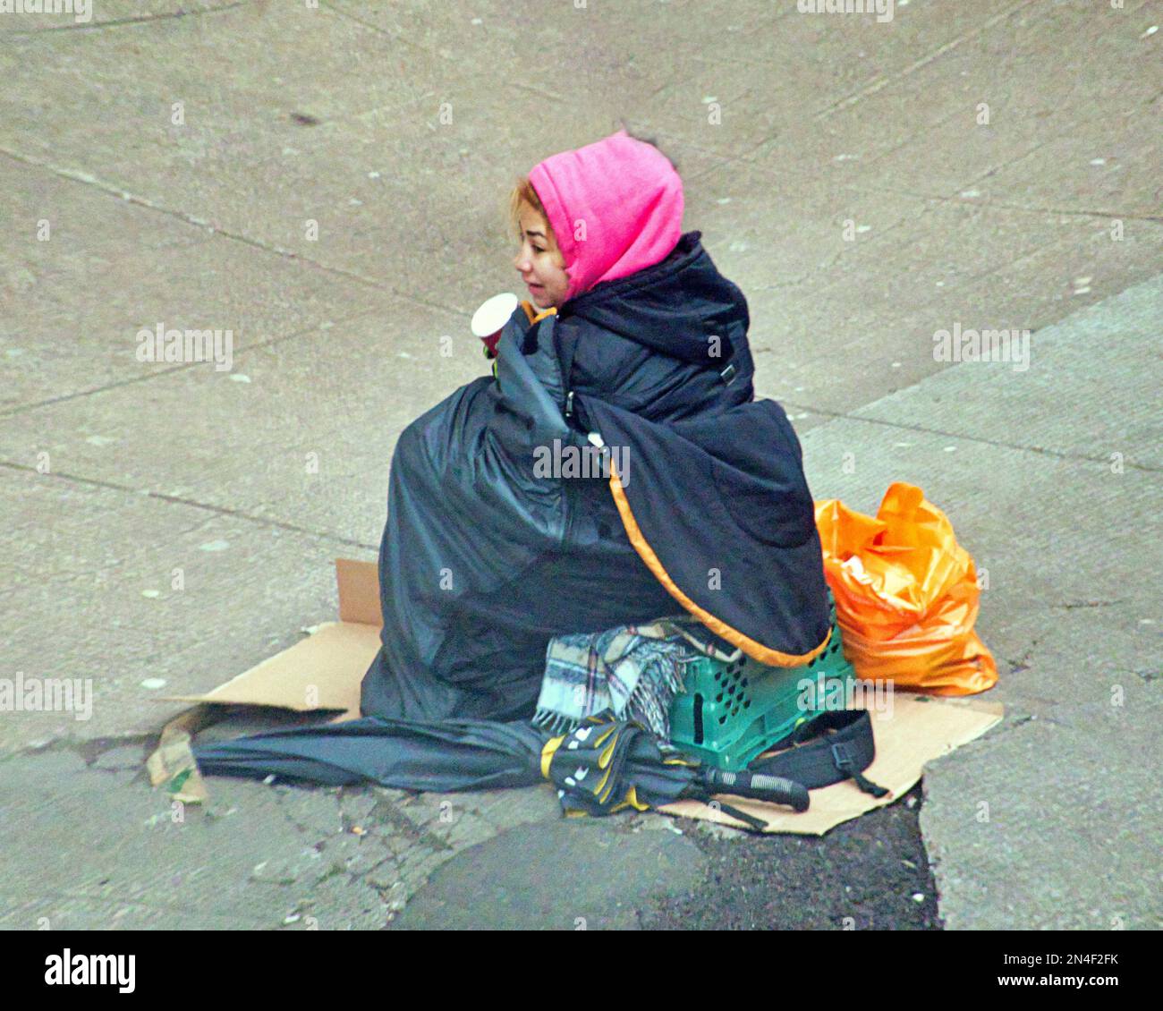 Homeless poverty cup money hi-res stock photography and images - Alamy