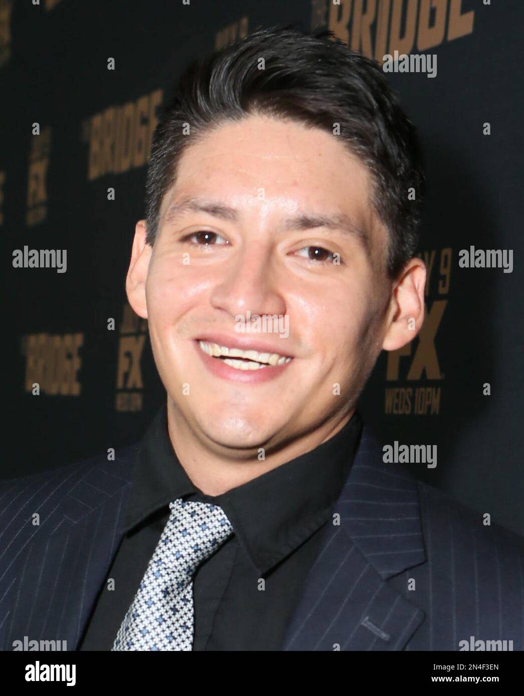 Carlos Pratts arrives at the premiere screening of "The Bridge" at the Pacific Design Center on ...