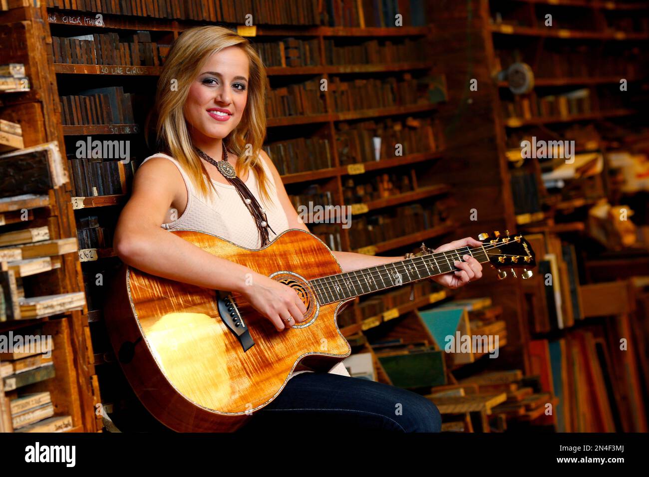 Mary Sarah poses for a portrait at Hatch Show Print inside The Country ...