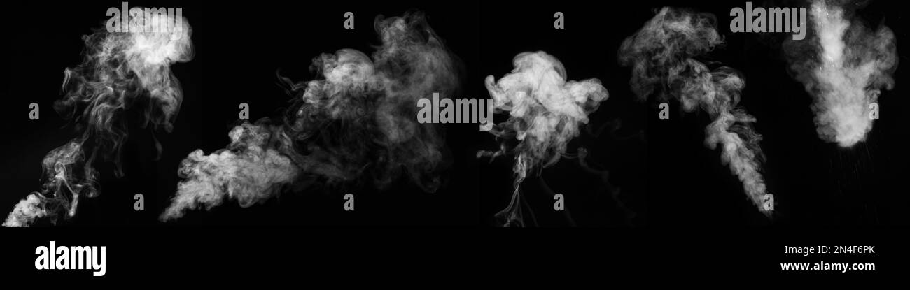 A set of different steam, smoke, gas isolated on a black background ...
