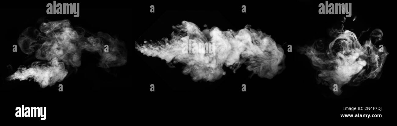A set of different steam, smoke, gas isolated on a black background ...