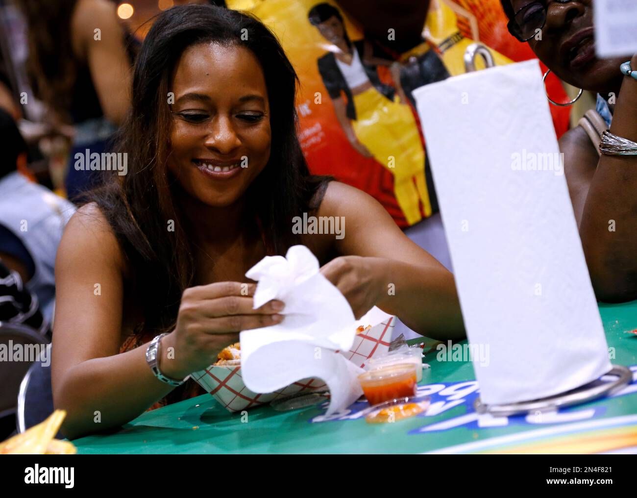 Simone Williams, of California, uses Bounty during Essence Festival in ...