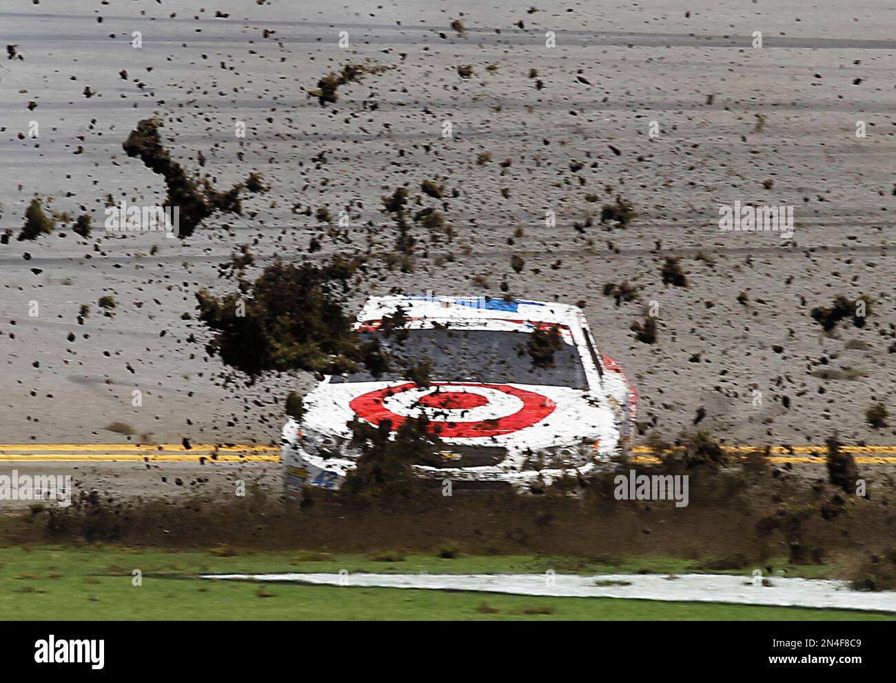 Kyle Larson slides through the infield after he was involved in a crash ...