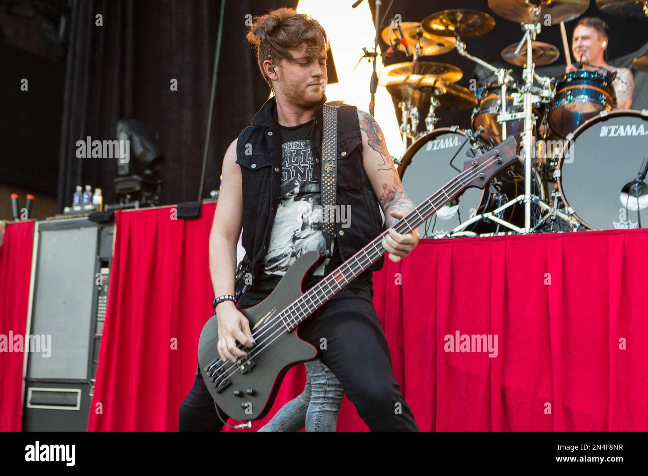 Bassist Sam Bettley of Asking Alexandria performs at the Rockstar ...