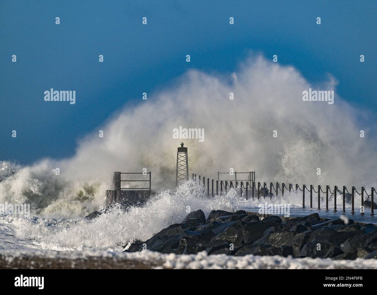 30 January 2023, Denmark, Vorupör: Waves of strong surf beat up on the ...