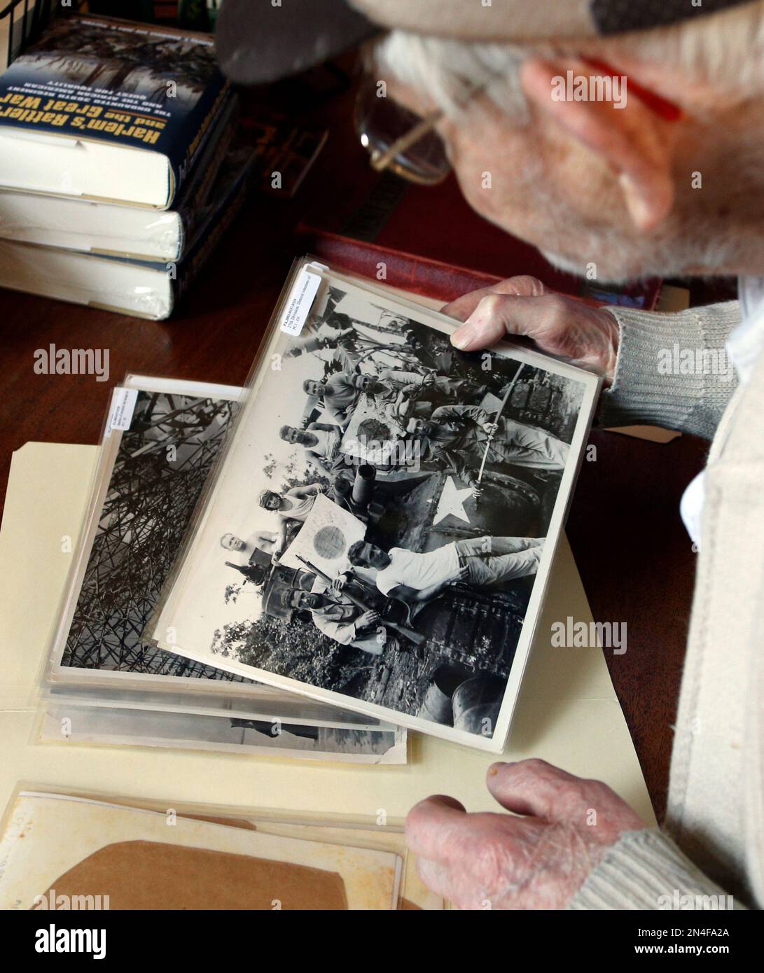 World War II veteran Arthur Robinson of Saratoga Springs, N.Y., looks ...
