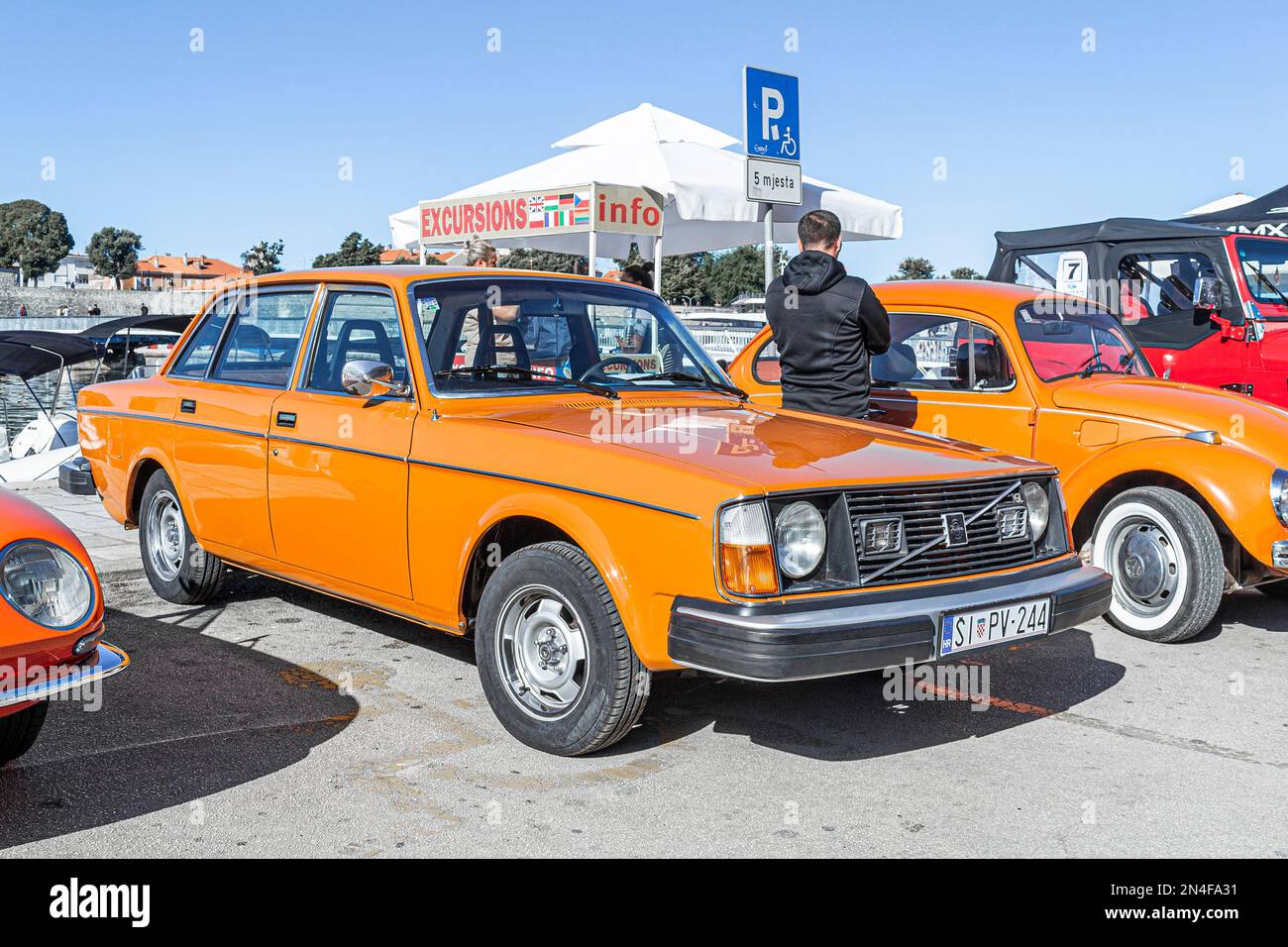 A vintage old-timer orange Swedish Volvo car Stock Photo - Alamy