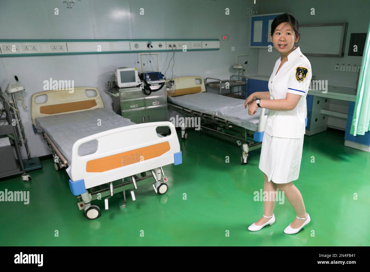 CORRECTS SPELLING OF HICKAM, NOT HICKHAM - Nurse He Yun gives a tour of ...