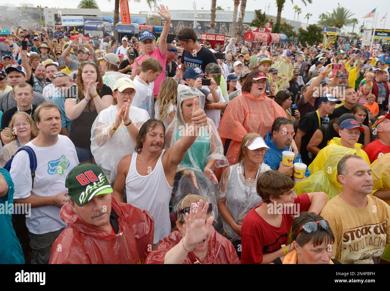 Race fans watch Dale Earnhardt Jr. in the Fan Zone before the NASCAR ...