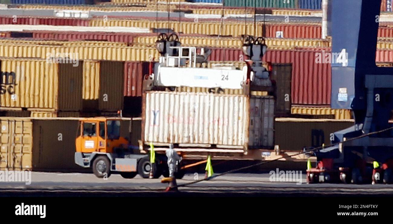 A container from the Danish vessel Ark Futura is lowered onto a truck ...