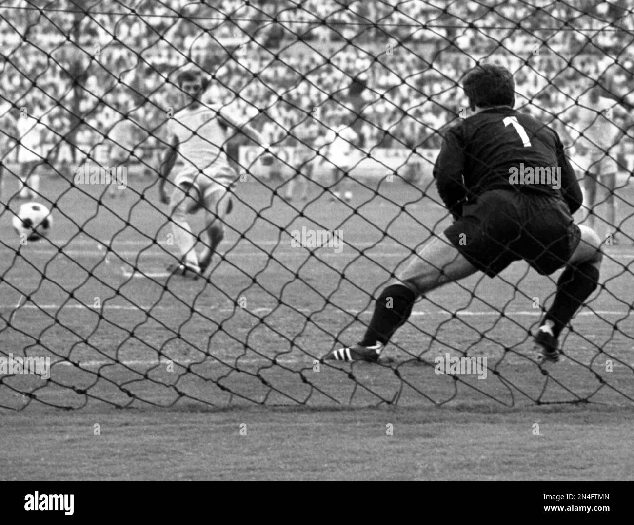 England's Allan Clarke scores a penalty for his team, sending ...