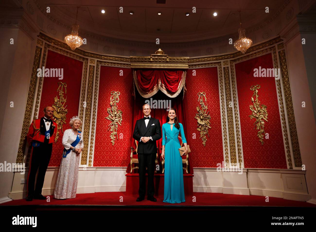 The wax figures of Britain's Prince William, left, and his wife Kate ...