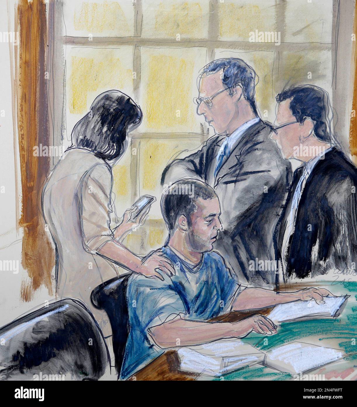 In this courtroom sketch, GIlberto Valle, second from left, looks over ...