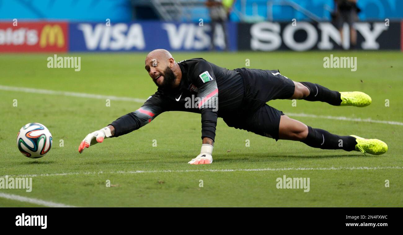 United States' goalkeeper Tim Howard stretches to make a save during ...