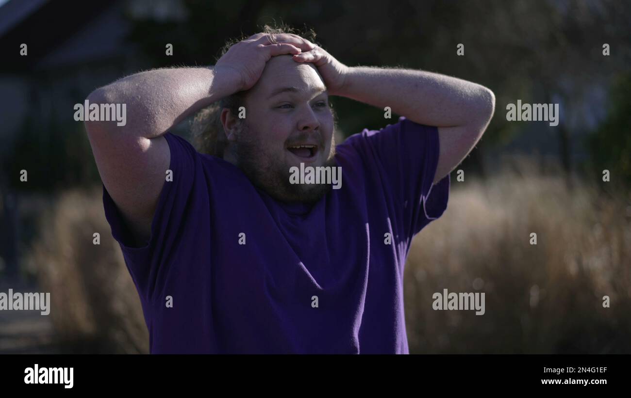 One happy overweight man walking forward outdoors smiling. A joyful fat ...