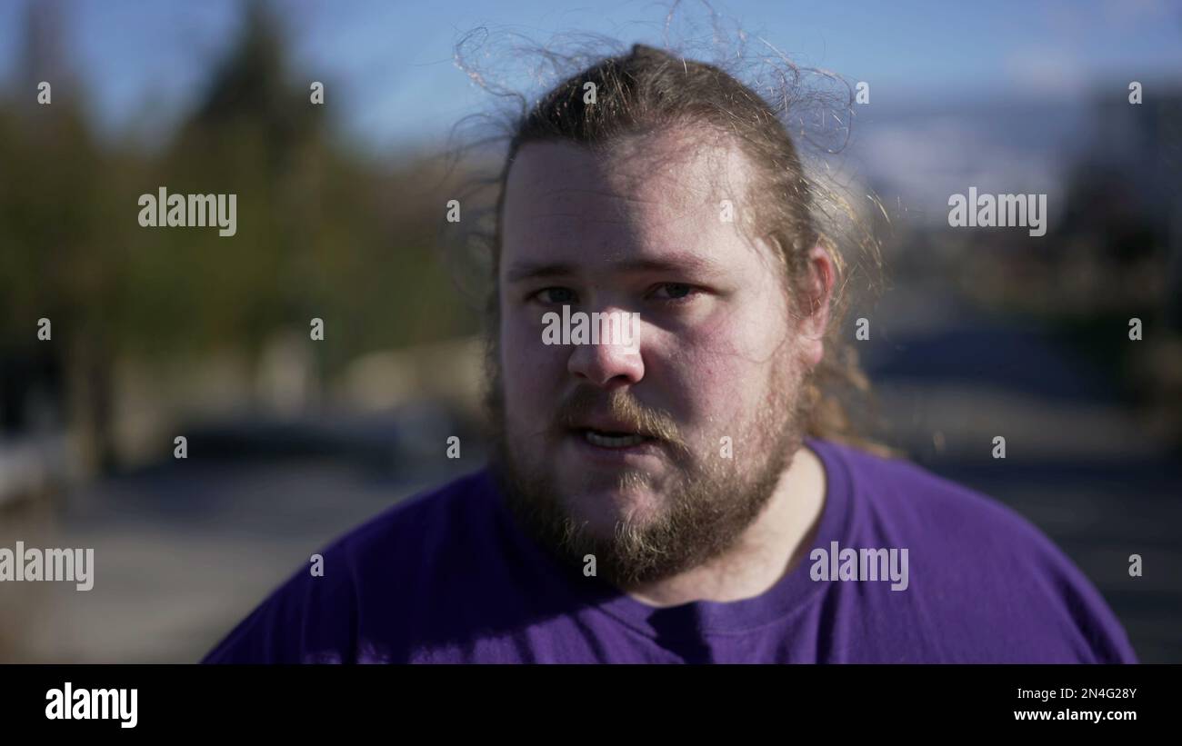 One angry young man arguing and pointing to camera POV. Portrait of a ...