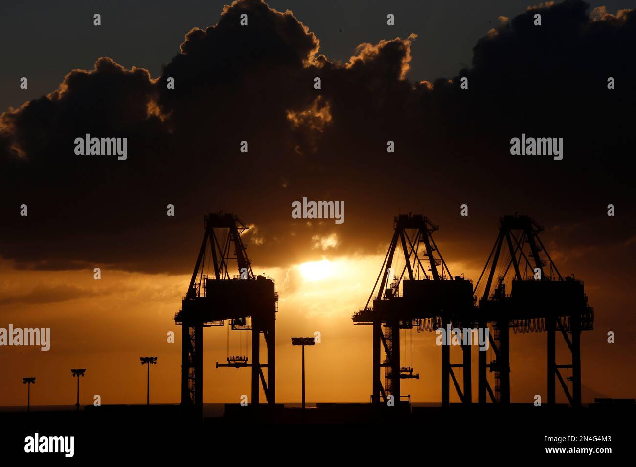 A view of the port of Gioia Tauro at sunset, Italy, Monday, June 30 ...