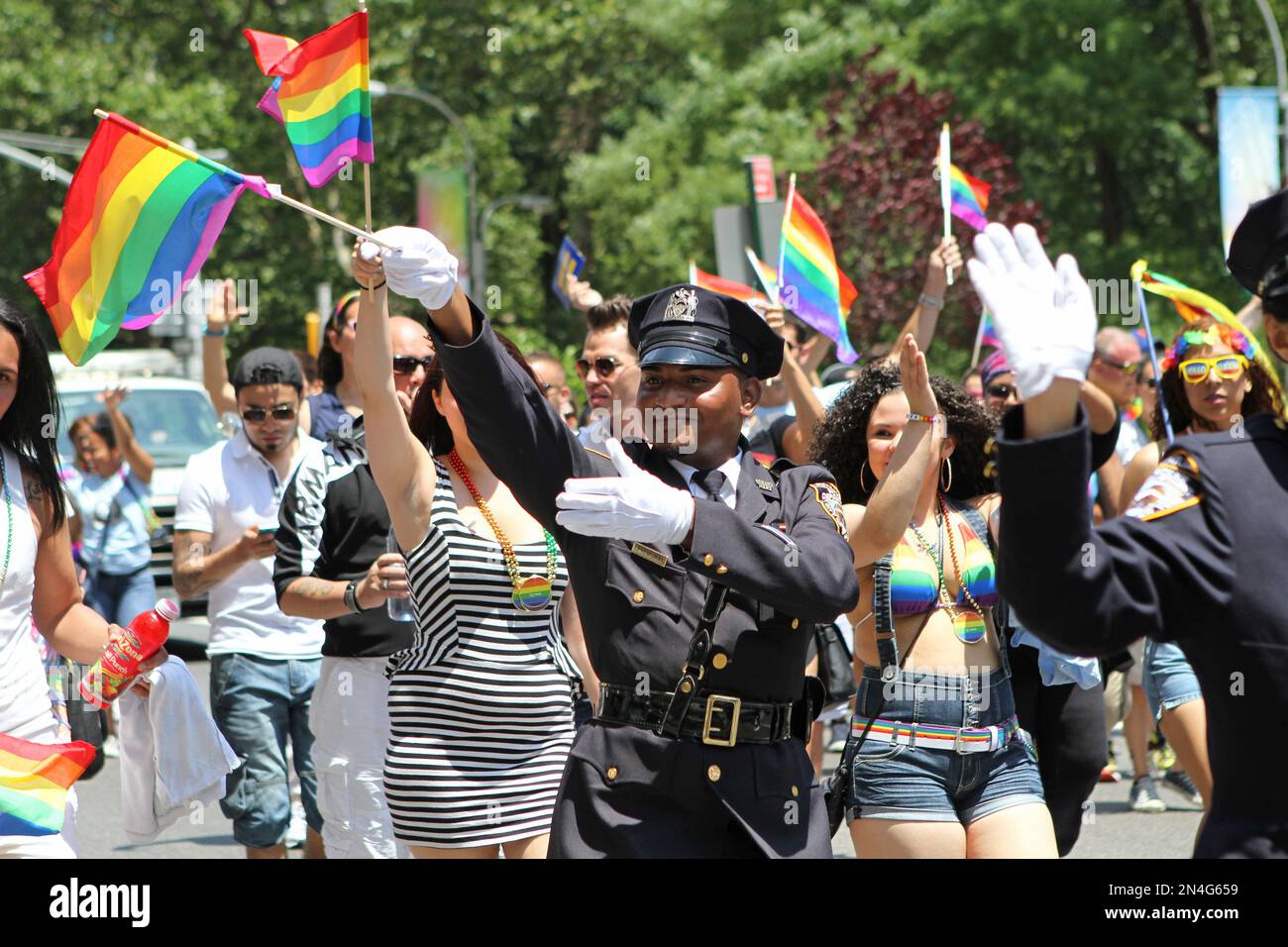 NYPD police officers march along Fifth Avenue during the gay pride ...