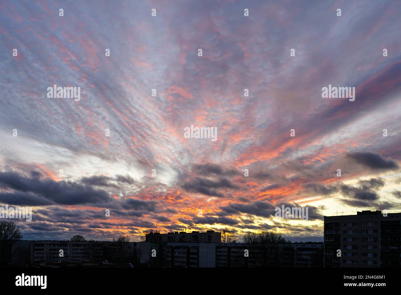 Scenic dramatic sunset skyscape with beautiful colorful clouds in an ...