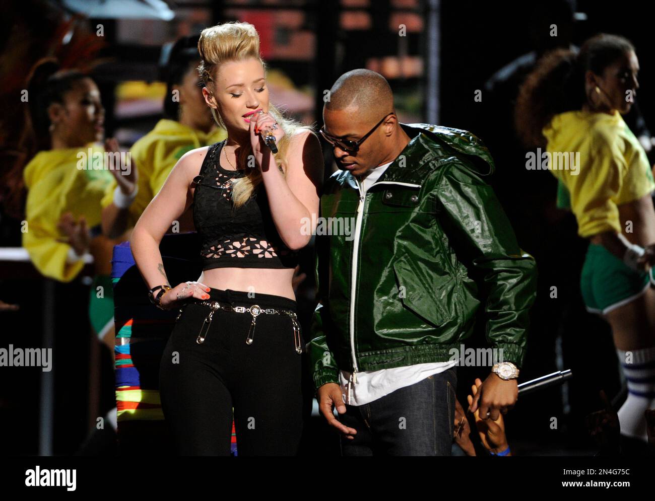 Iggy Azalea, left, and T.I. perform at the BET Awards at the Nokia ...