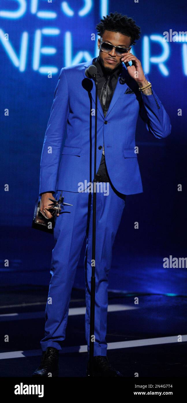 August Alsina accepts the award for best new artist at the BET Awards ...