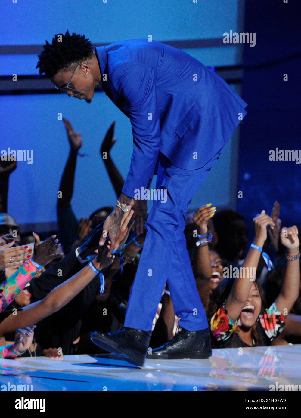 August Alsina accepts the award for best new artist at the BET Awards ...