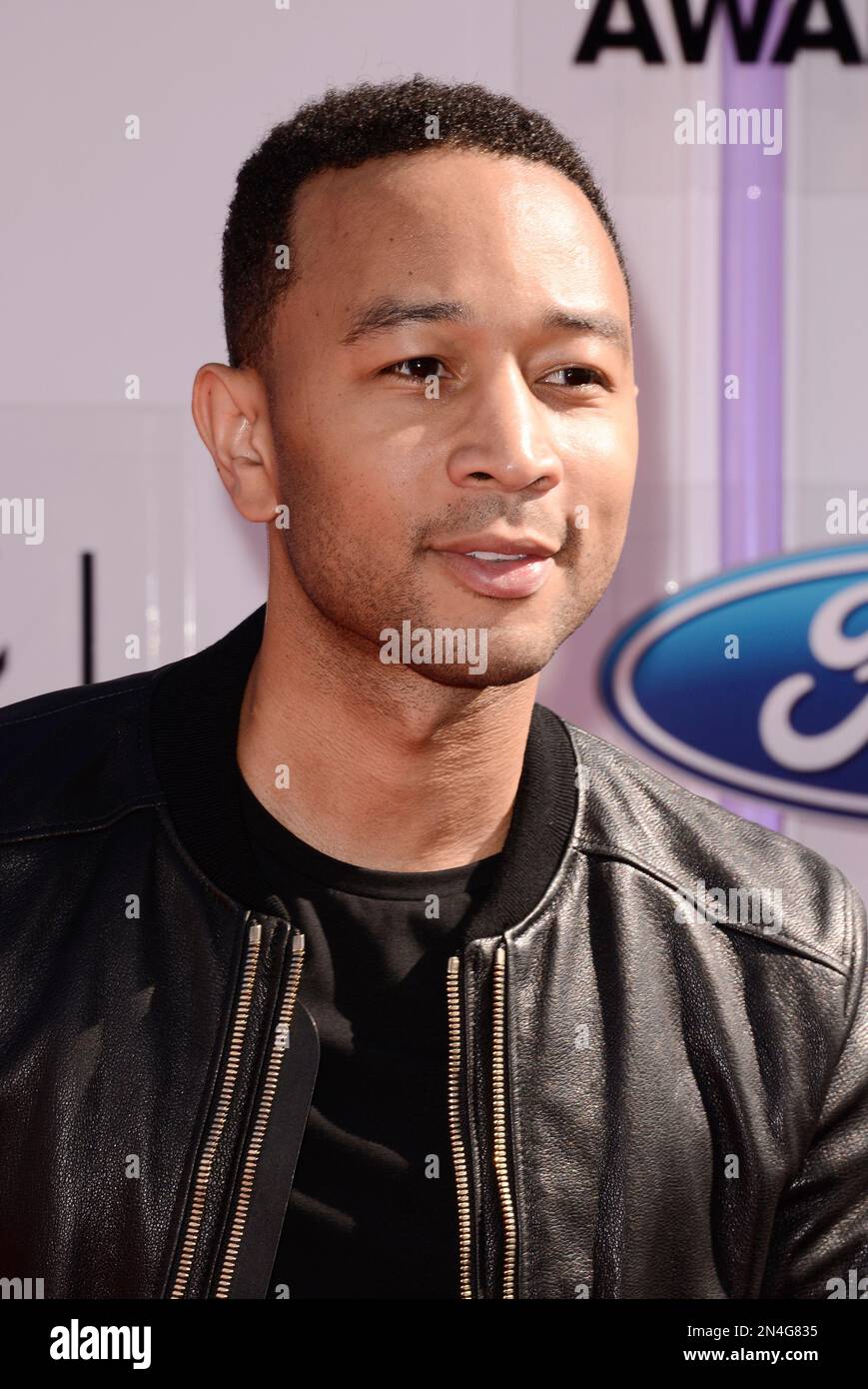 John Legend arrives at the BET Awards at the Nokia Theatre on Sunday ...